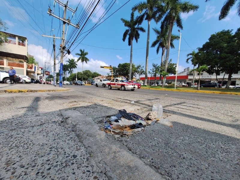 El Heraldo de Poza Rica - Calles inundadas de baches